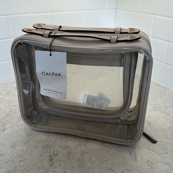 Calpak | Bags | Nwt Calpak Large Clear Cosmetics Case In Stone | Poshmark